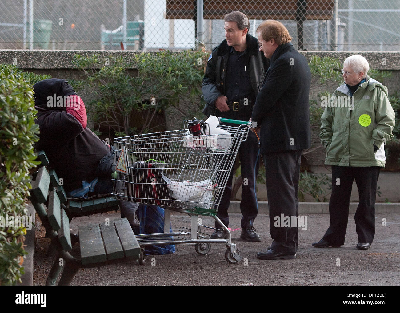 A homeless man talks with San Mateo police officer Robert Anderson ...