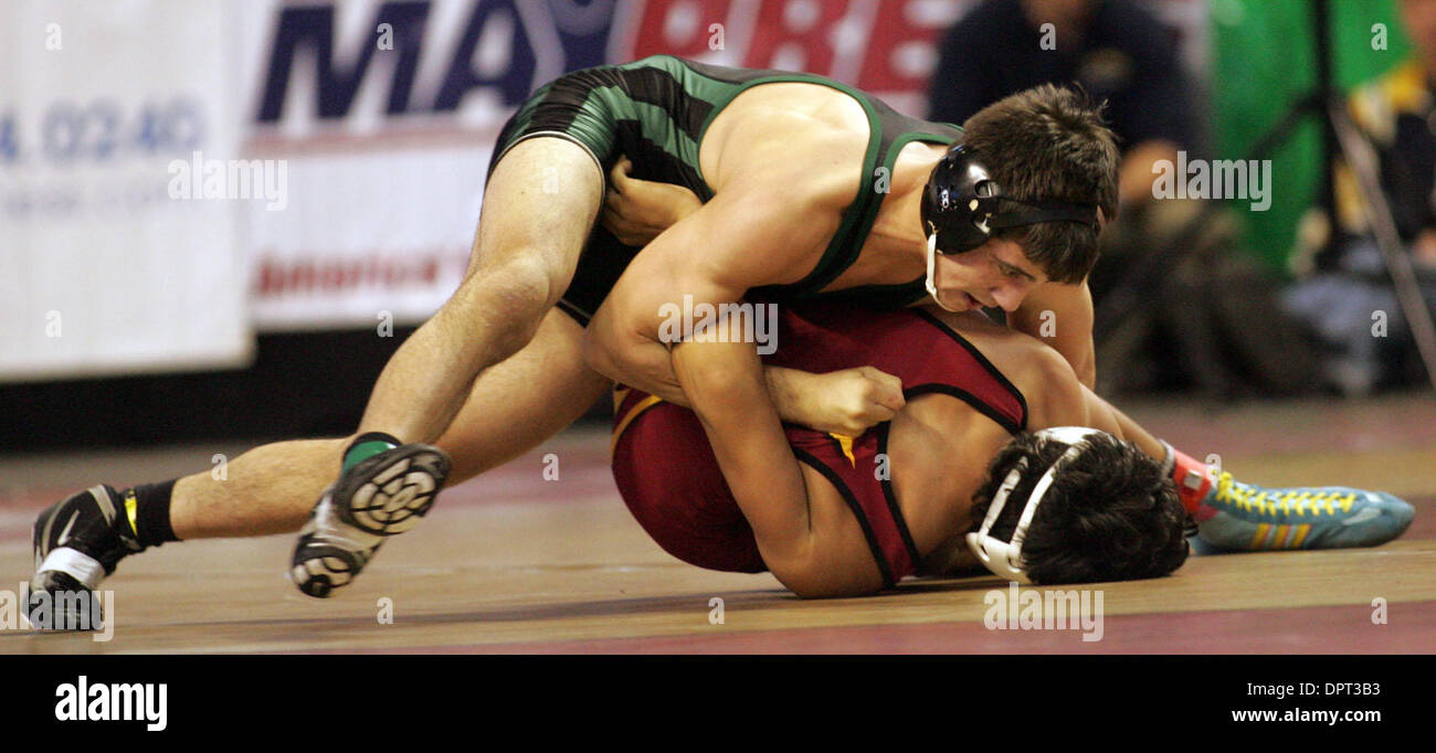 De La Salle's Tyler Sheridan, top, tries to turn Clovis West's Nikko ...