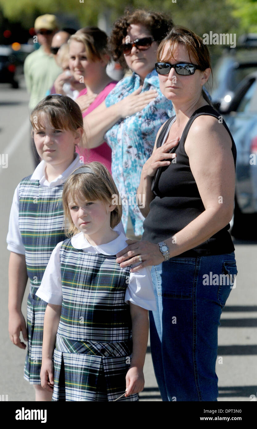 Anne Chapuis of Danville, Calif., right, stands with her two children ...