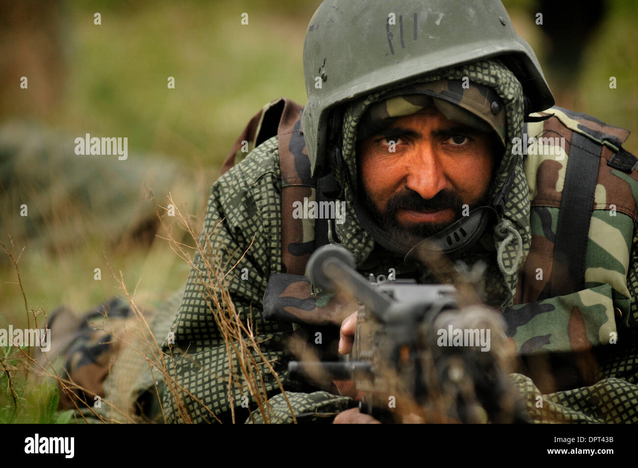 Apr 08, 2009 - Camp Morehead, Afghanistan - An Afghan Commando takes up ...