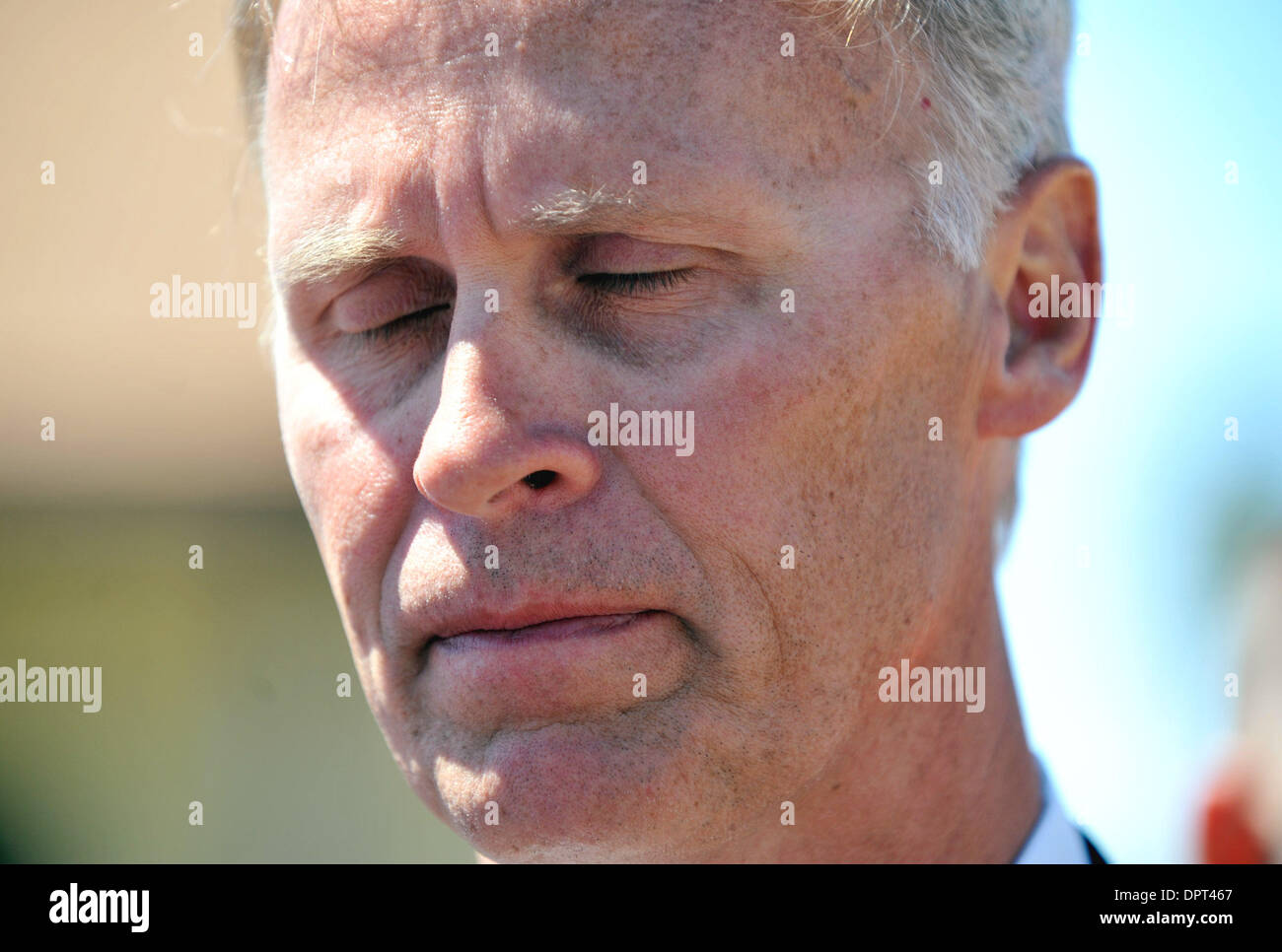 Brian Lawless, from Orange County, closes his eyes while speaking of ...