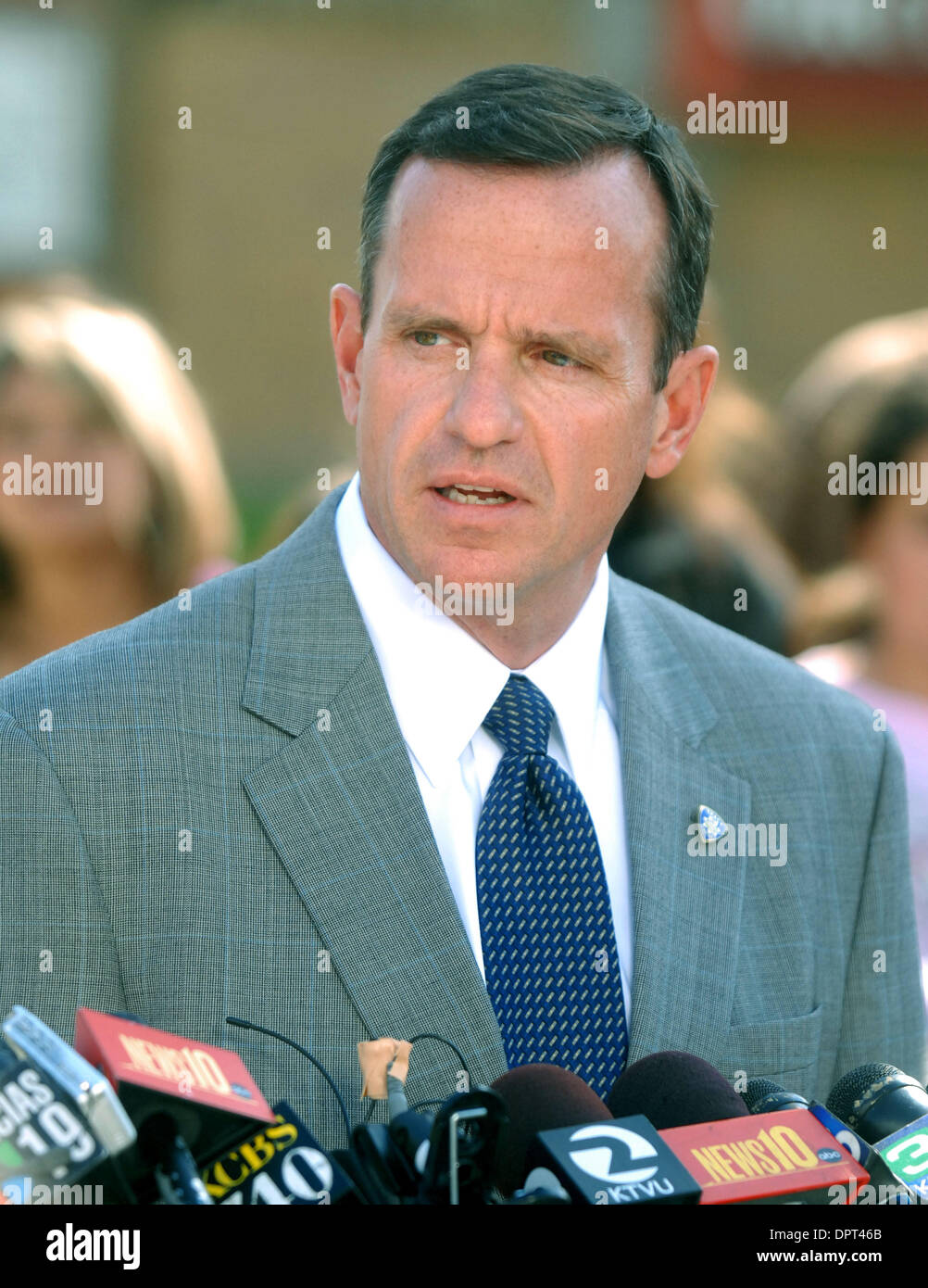 Tracy Police Sergeant Tony Sheneman talks to the media and members of ...