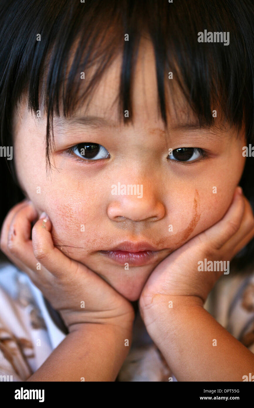 Cute chinese baby girl thinking hi-res stock photography and images - Alamy