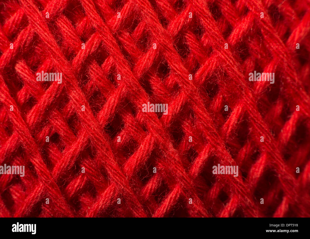 Red yarn close up background Stock Photo - Alamy