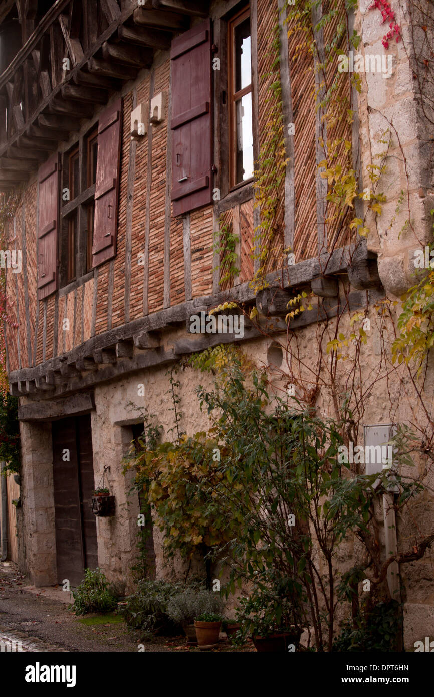 Medieval part-timbered houses in the old village of Issigeac, Dordogne ...