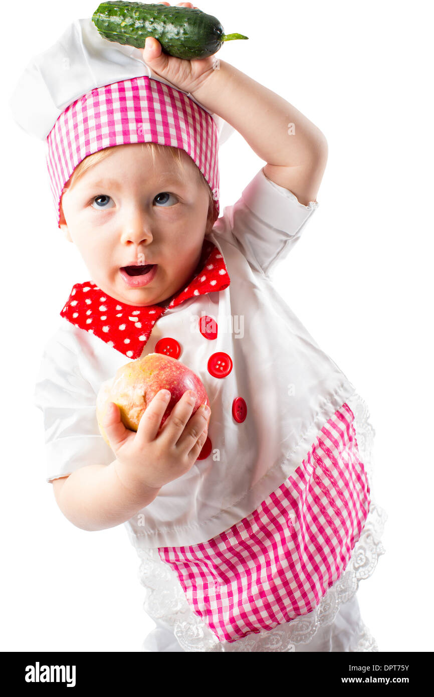 Baby cook girl wearing chef hat with fresh vegetables Use it for a ...