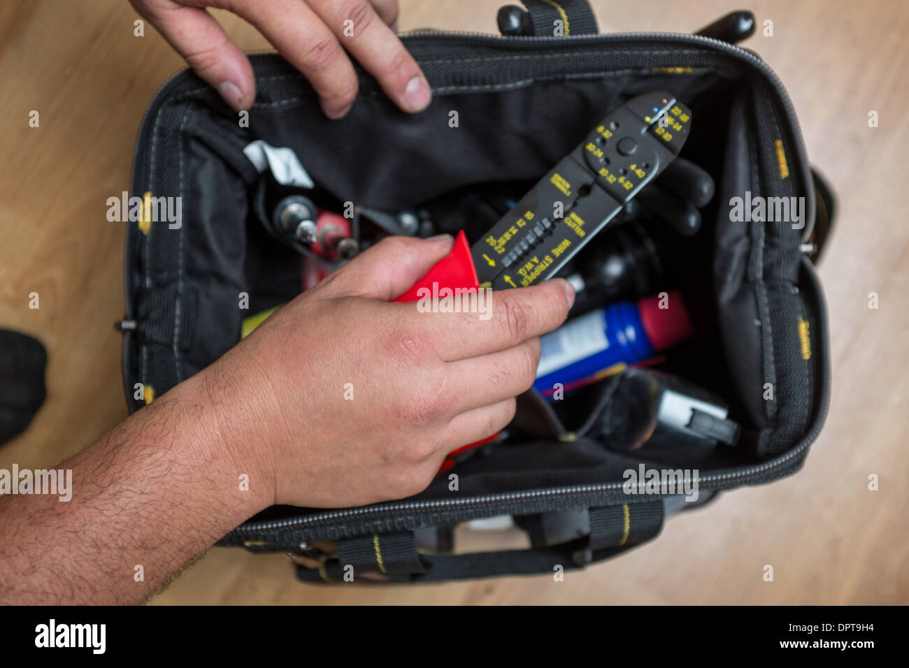 Handyman repairman HVAC tools Stock Photo - Alamy