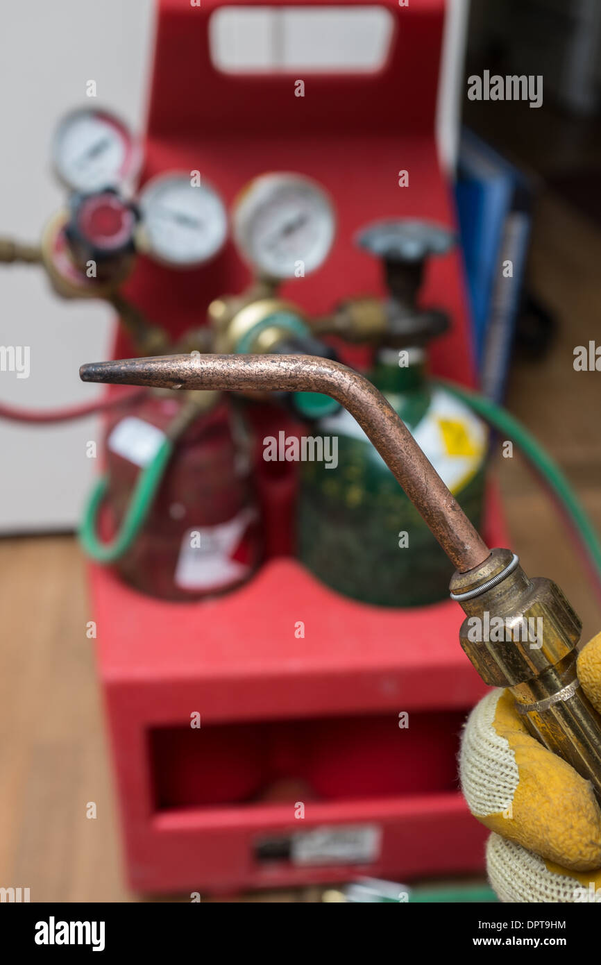 Handyman repairman HVAC tools Stock Photo - Alamy