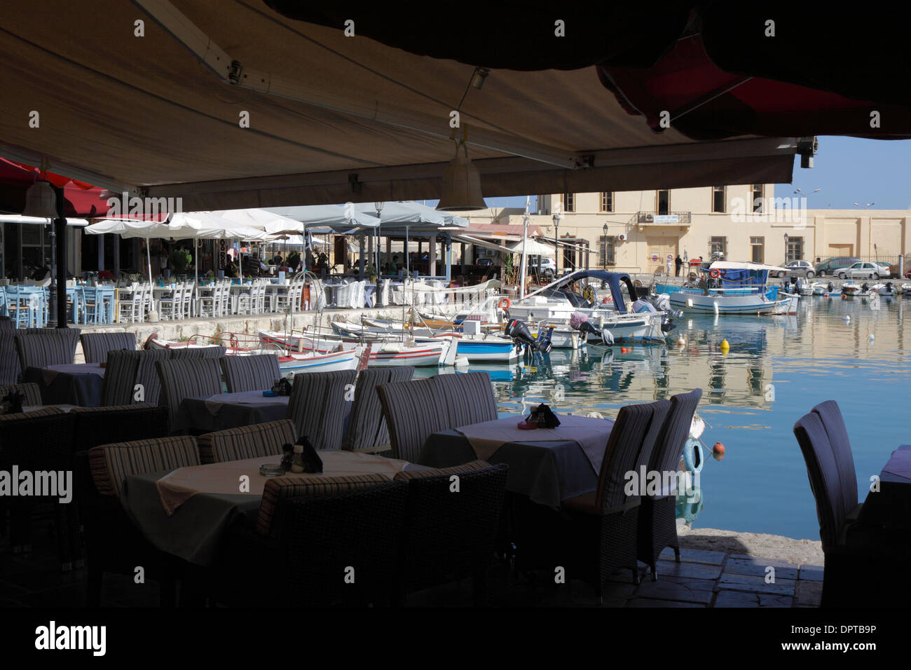 QUAYSIDE RESTAURANTS IN THE VENETIAN HARBOUR AT RETHYMNON. CRETE Stock ...
