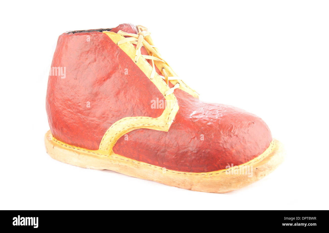 Large red shoe isolated on white background Stock Photo - Alamy