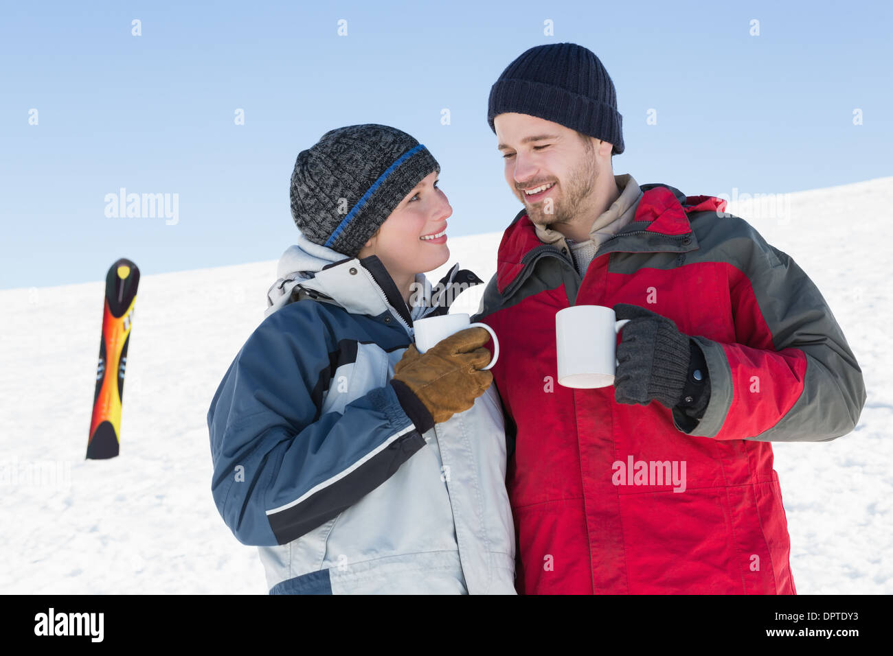 Male holding coffee in snow hi-res stock photography and images - Alamy