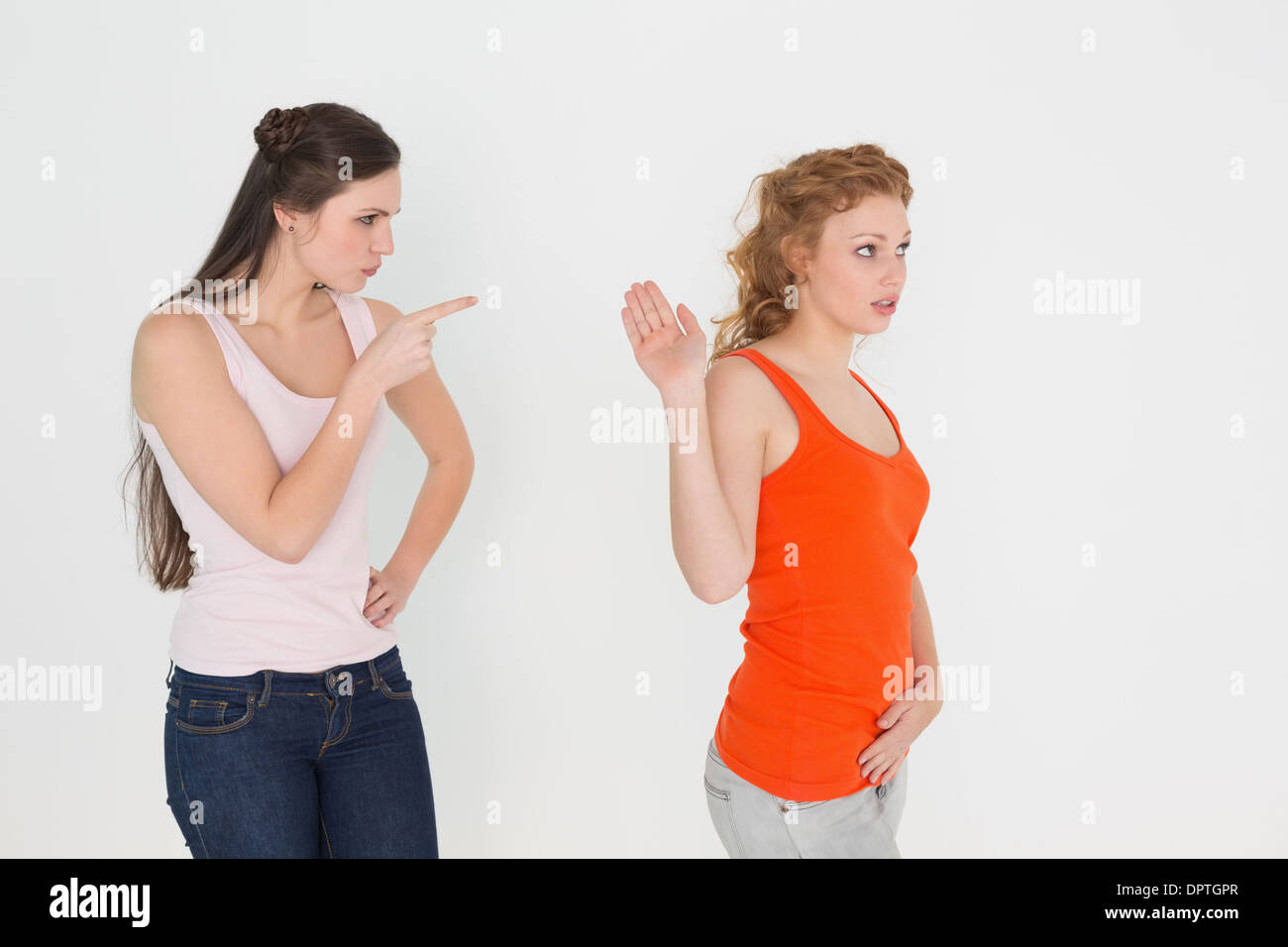Angry young female friends having an argument Stock Photo - Alamy