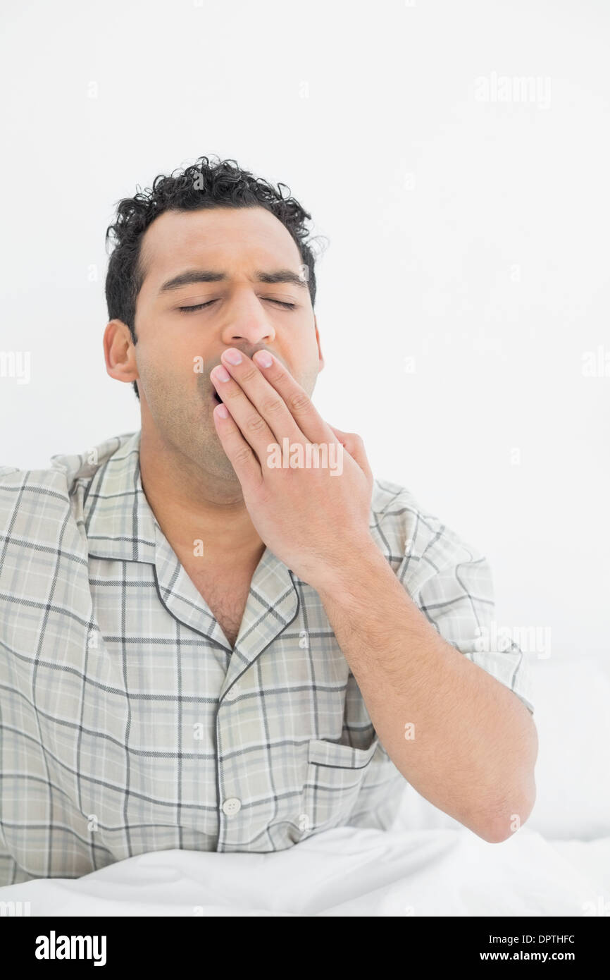 Waking in bed yawning hi-res stock photography and images - Alamy