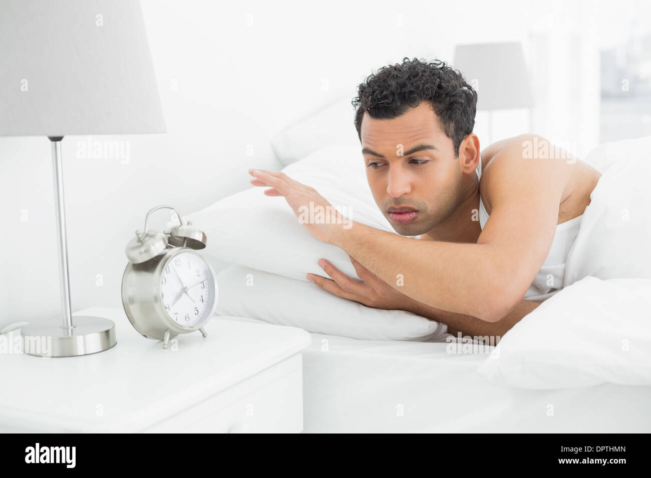 Man looking clock hi-res stock photography and images - Alamy