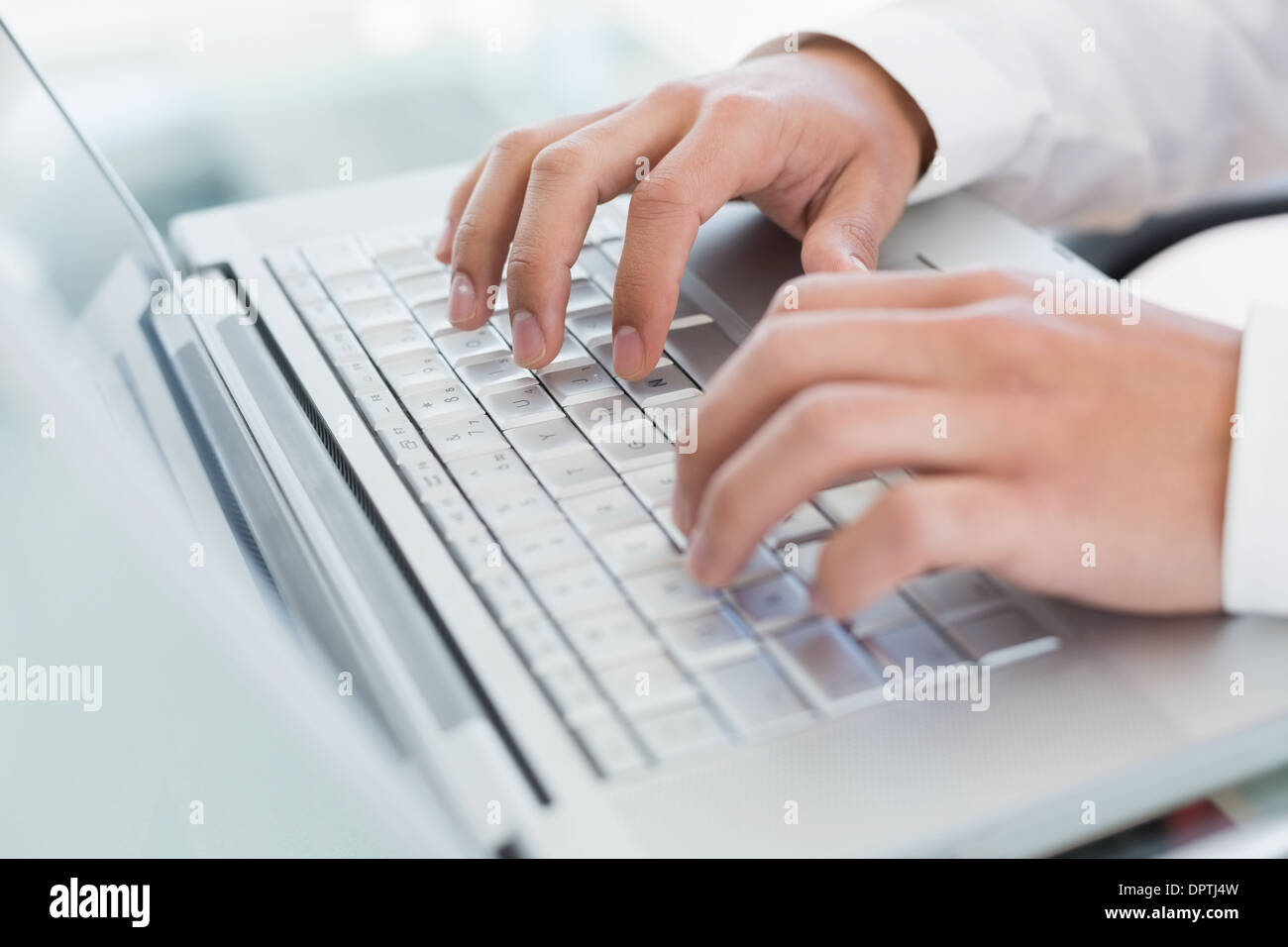 Caucasian businessman using laptop hands hi-res stock photography and ...