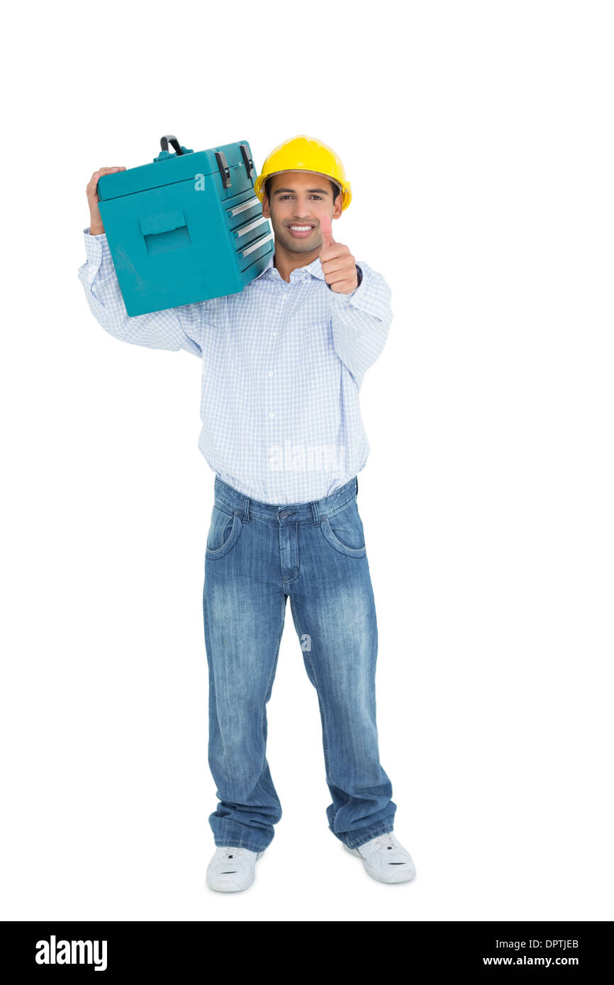 Handyman toolbox in hand Cut Out Stock Images & Pictures - Alamy