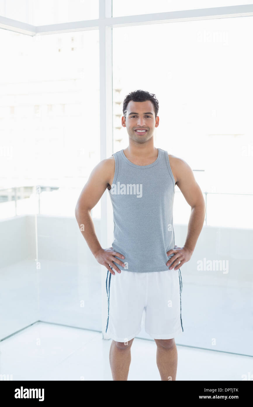 Man standing with hands on hips hi-res stock photography and images - Alamy