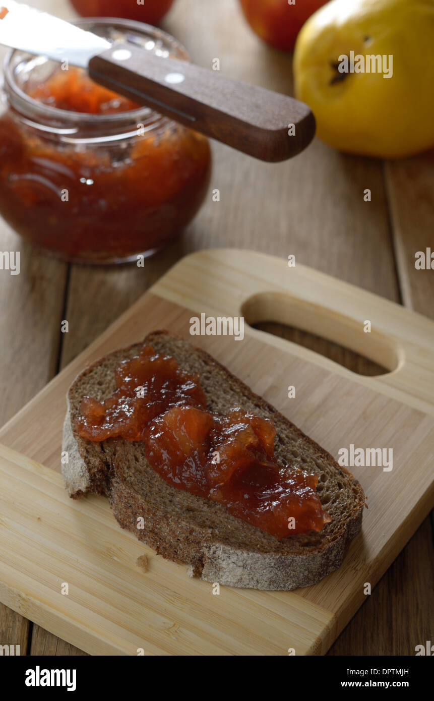 Bread and apple quince jam sandwich on the cut board Stock Photo - Alamy