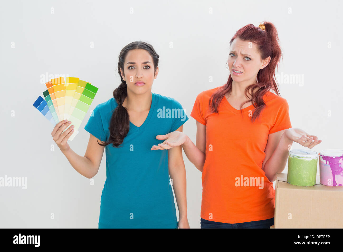 Confused female friends hi-res stock photography and images - Alamy
