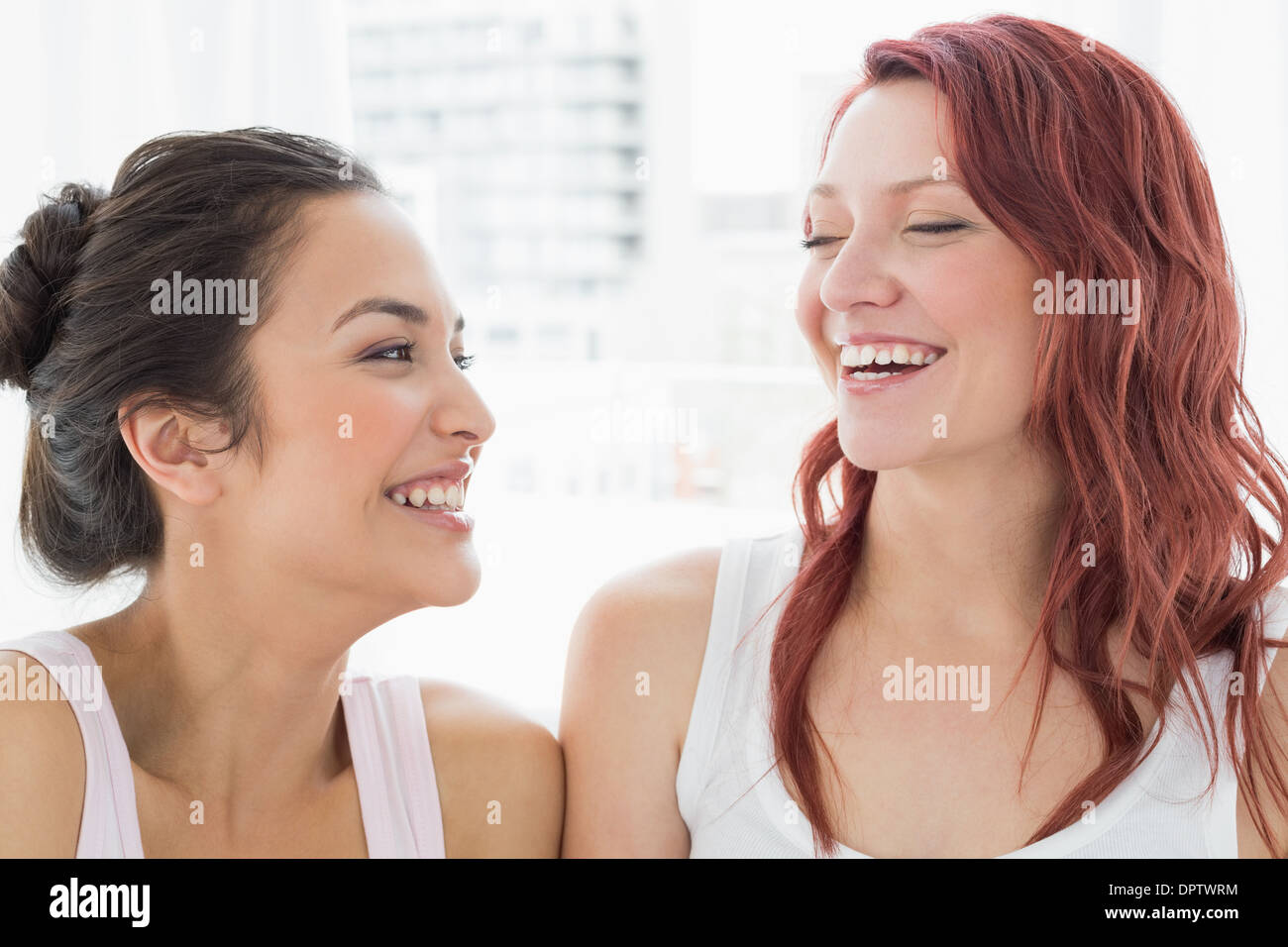 Female friends smiling hi-res stock photography and images - Alamy