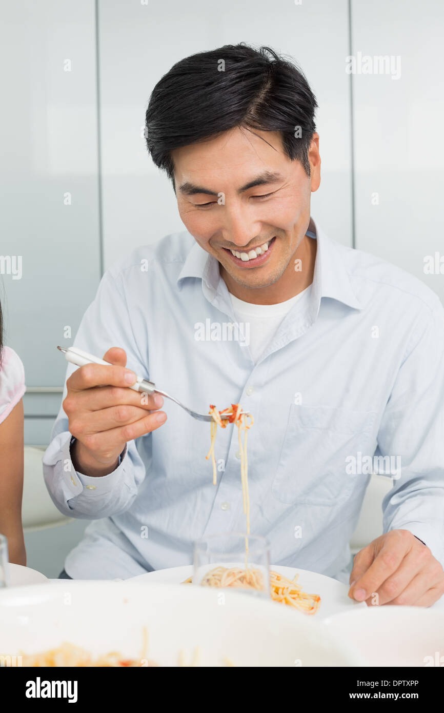 Man eating spaghetti hi-res stock photography and images - Alamy