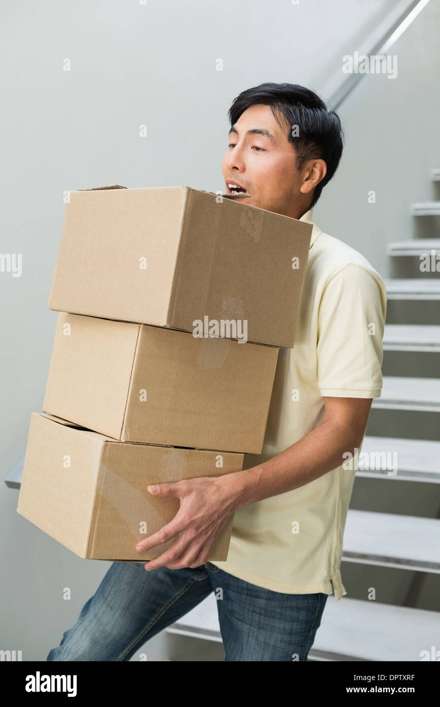Man Carrying Boxes