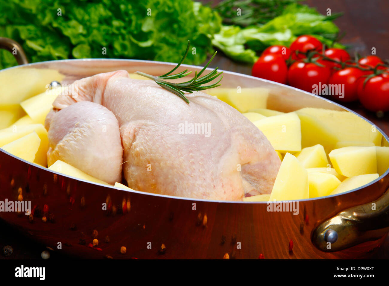 Raw - uncooked - chicken with vegetables Stock Photo - Alamy