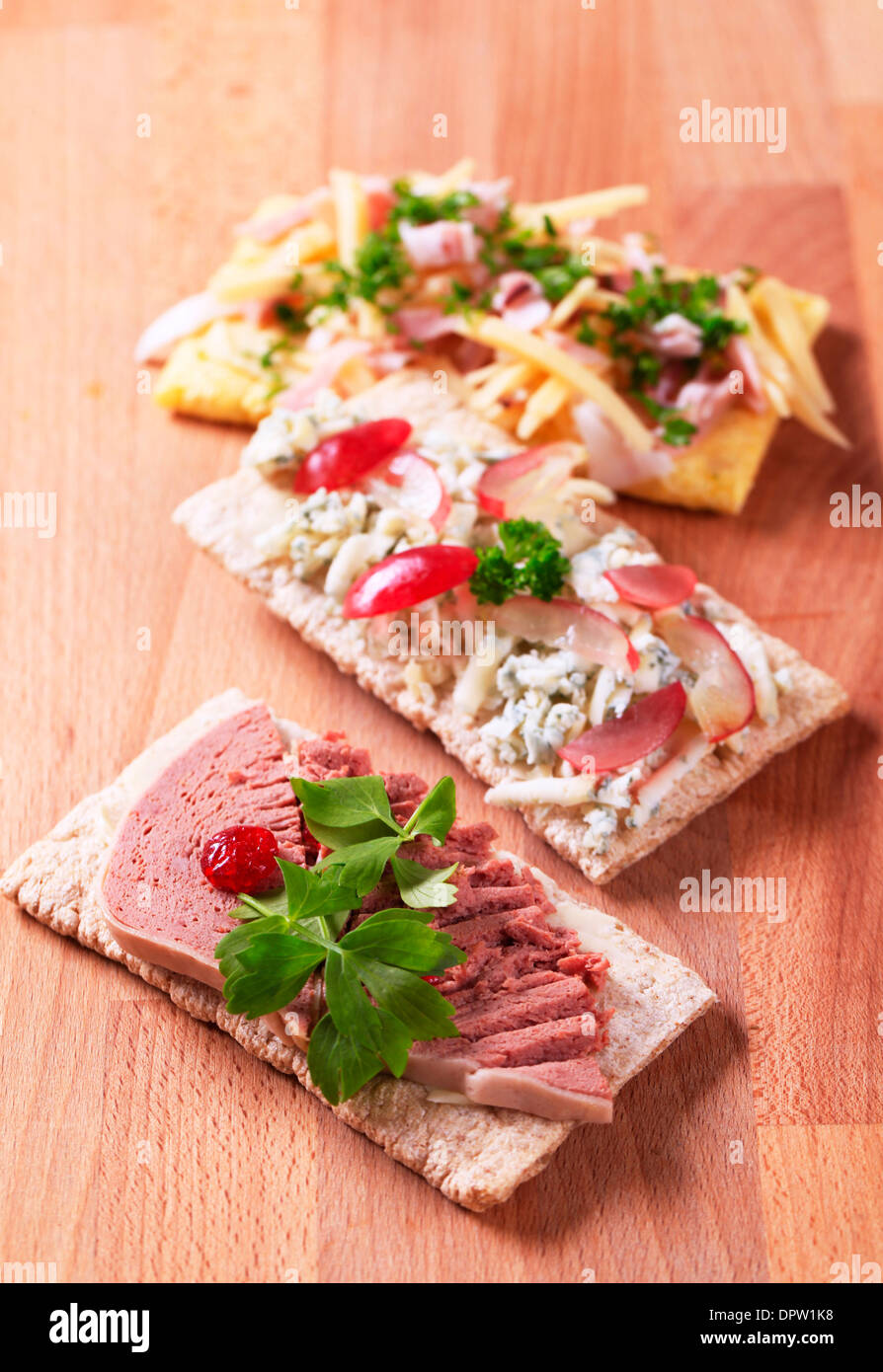 Crisp bread with various savory toppings Stock Photo - Alamy