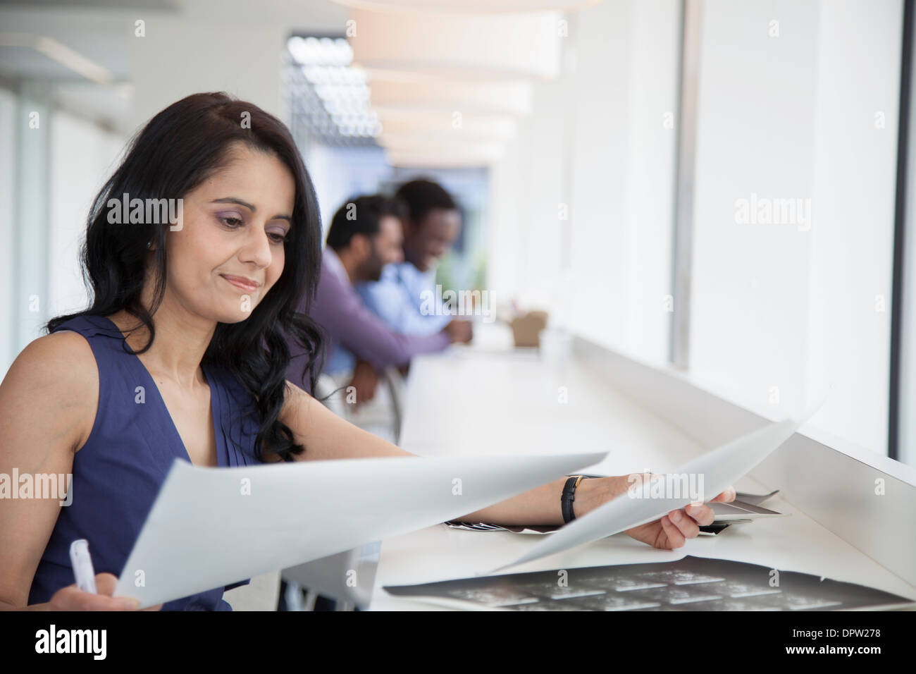 Female office worker Stock Photo - Alamy