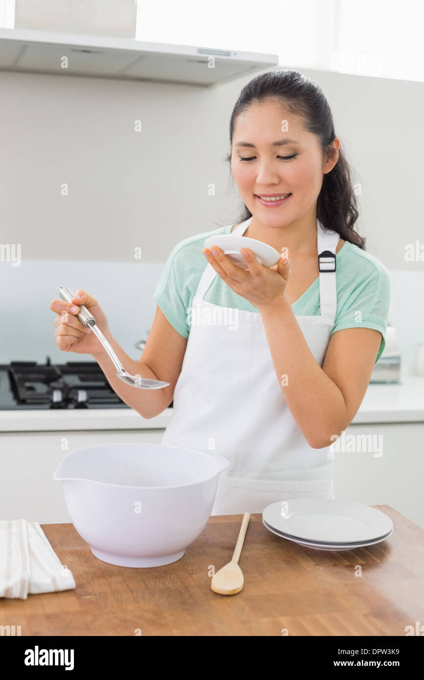 Woman preparing food in kitchen hi-res stock photography and images - Alamy