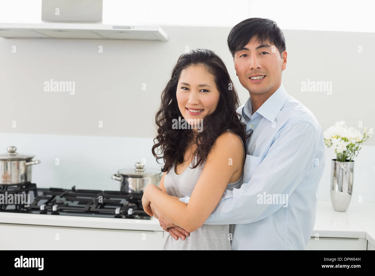 Couple behind kitchen High Resolution Stock Photography and Images - Alamy