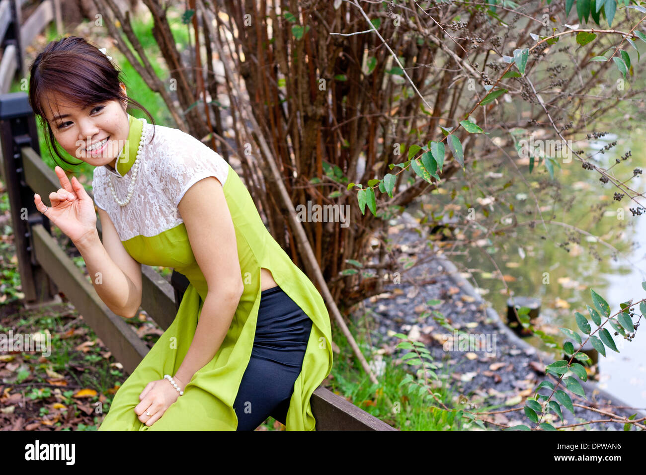 Young woman waiving hi-res stock photography and images - Alamy