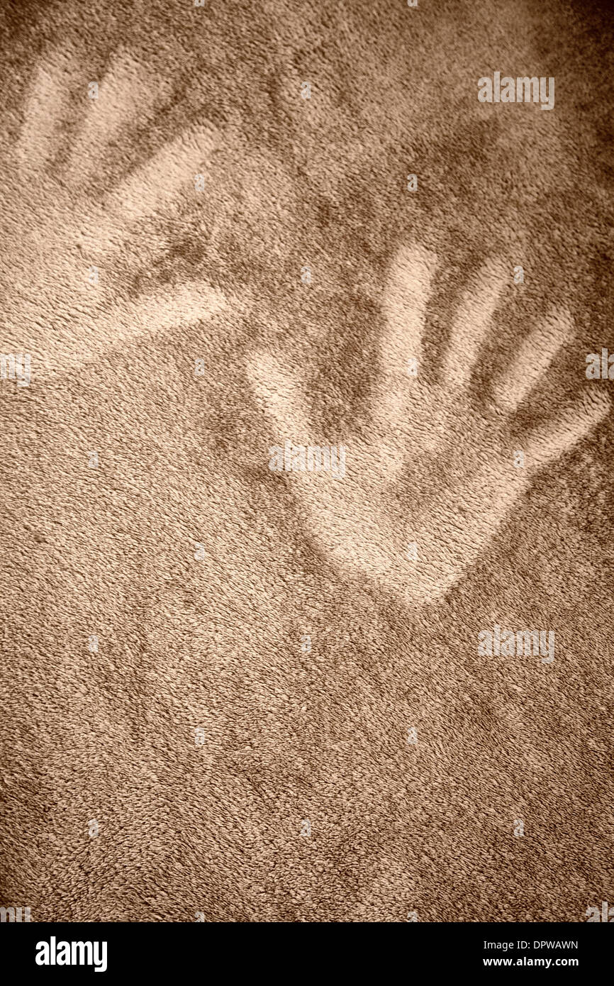 Hand Impression on Fabric Stock Photo - Alamy