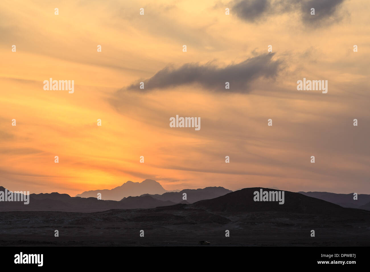 Desert at sunset Stock Photo - Alamy