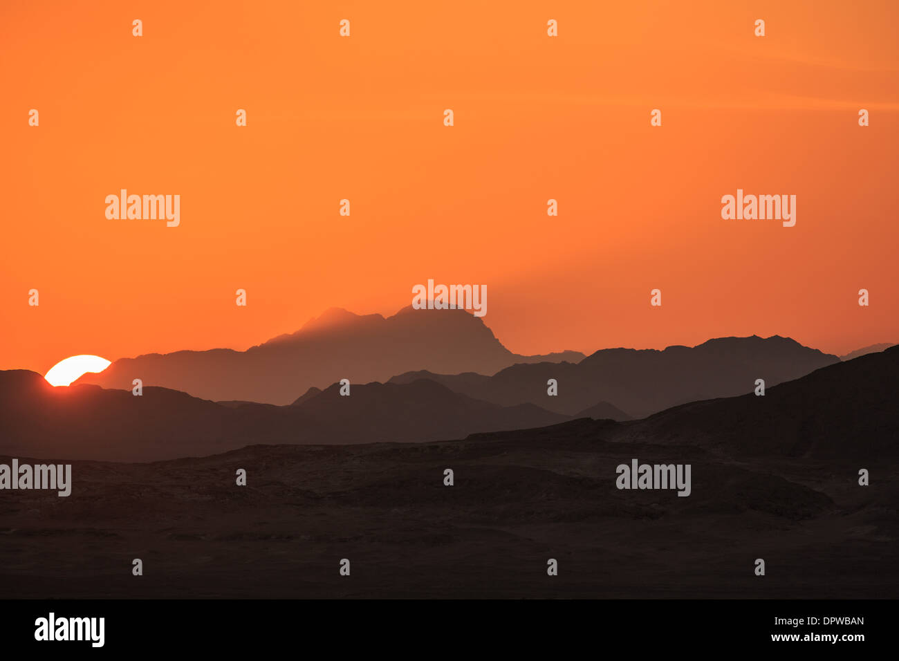 Desert at sunset Stock Photo - Alamy