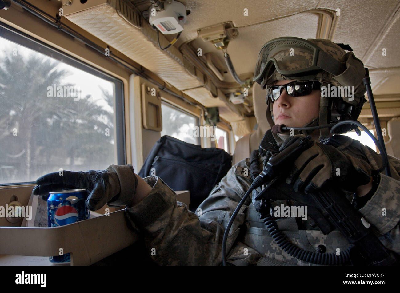 Feb 07, 2009 - Baghdad, Iraq - U.S. Army Sergeant FITZGERALD drinks a ...
