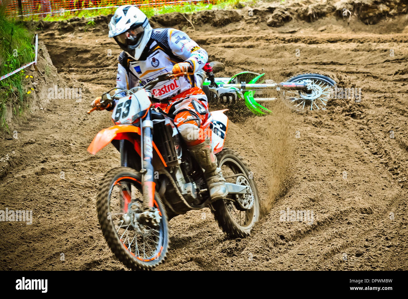 motocross rider during the race Stock Photo - Alamy