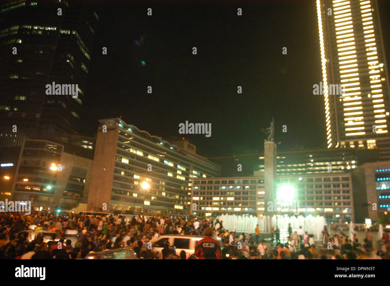 Dec 31, 2008 - Jakarta, Indonesia - People mill about before fireworks ...