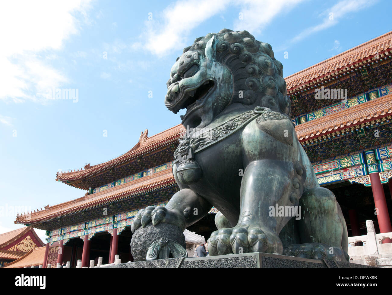 Traditional guardian lion bronze statue in front of Gate of Supreme ...