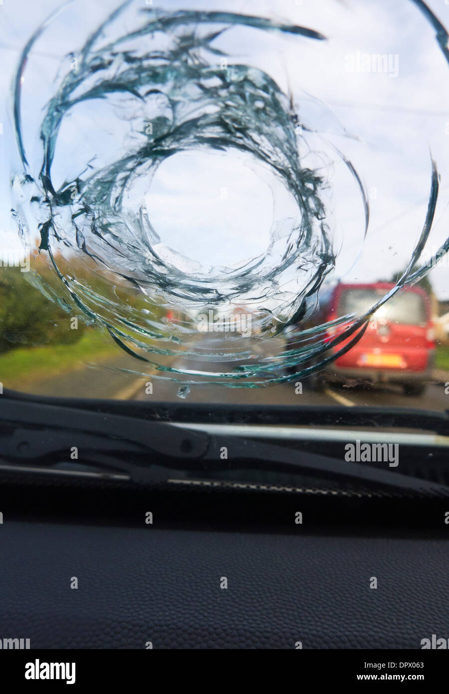 Vehicle windscreen damaged by a stone Stock Photo - Alamy