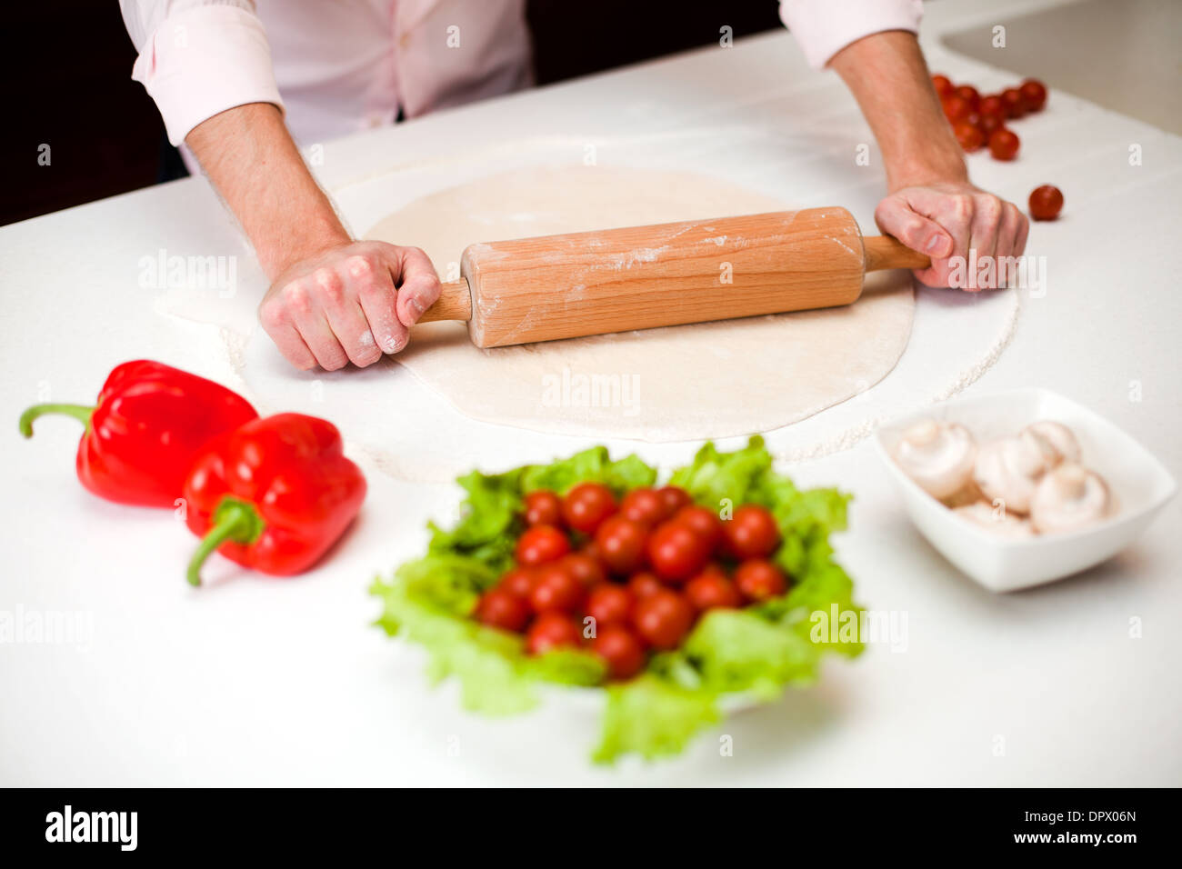 Preparing a dough for italian pizza close up Stock Photo - Alamy