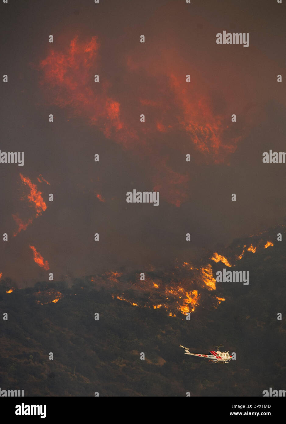 Los Angeles, Glendora. 16th Jan, 2014. A helicopter flies above the ...