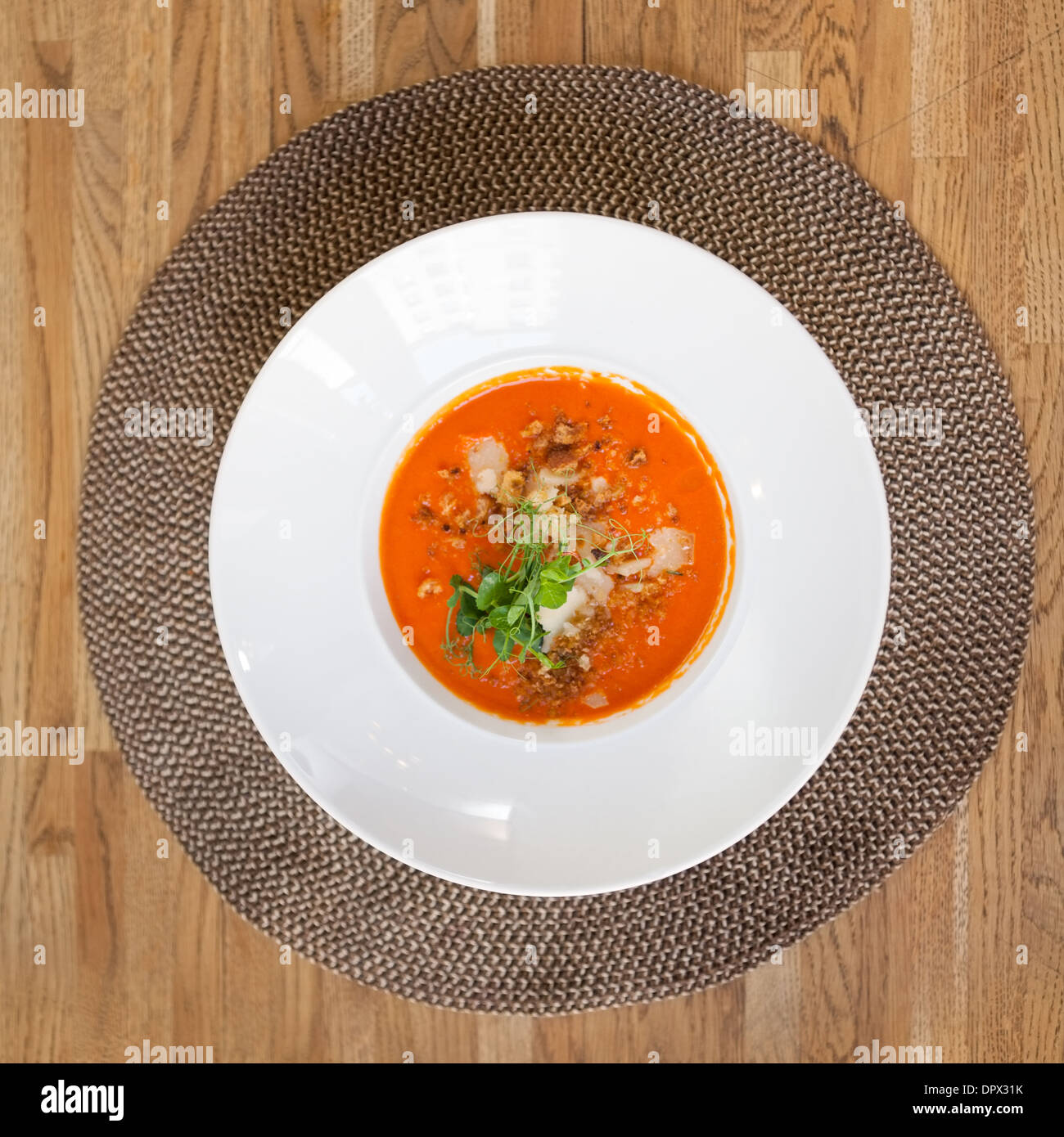 Tomato Soup On Table Stock Photo - Alamy