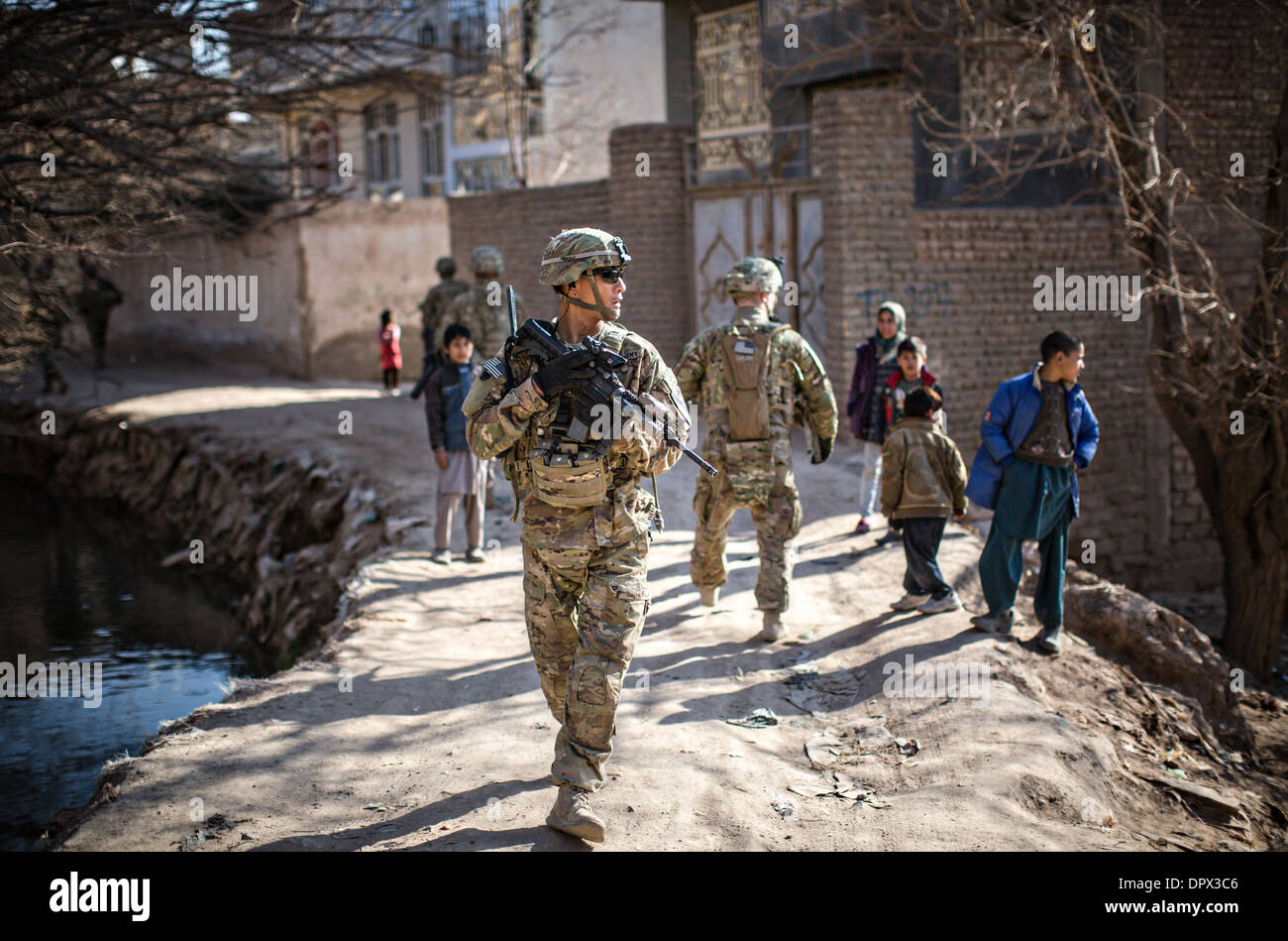 US Army soldiers conduct a presence patrol around the US Consulate ...