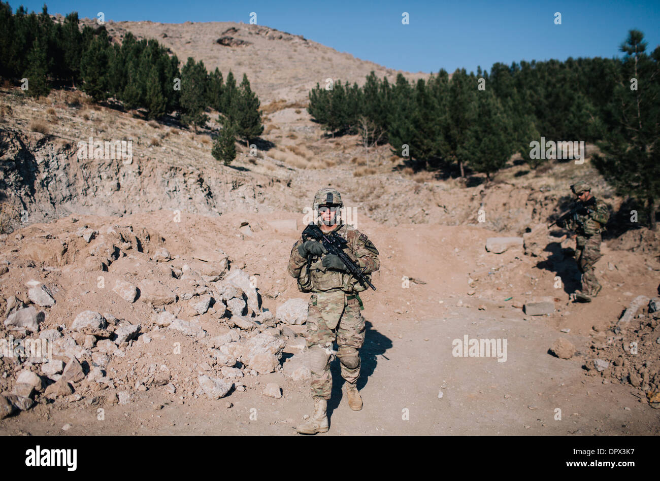 US Army soldiers conduct a presence patrol around the US Consulate ...