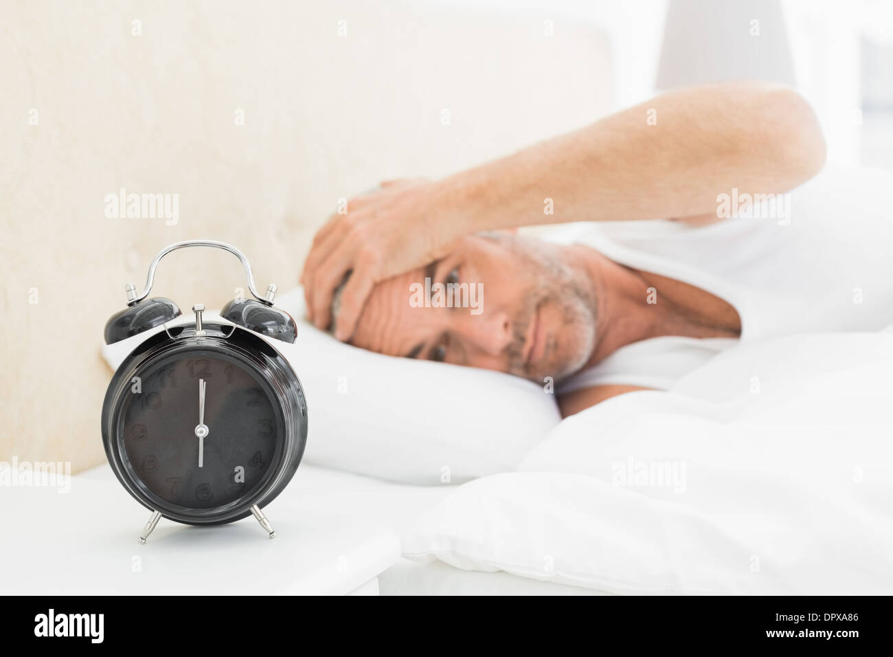 Black alarm clock man hi-res stock photography and images - Alamy