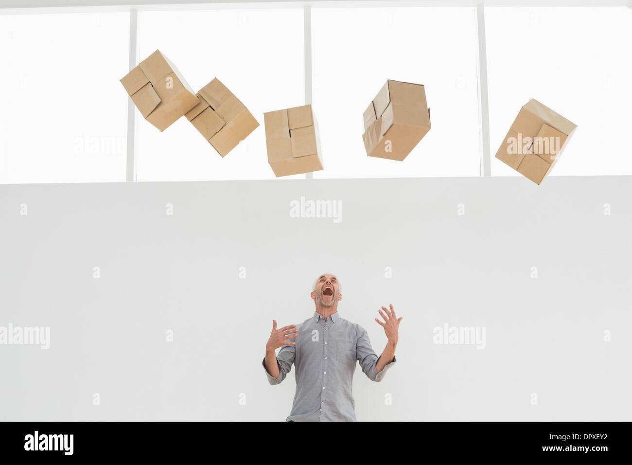 Falling boxes hi-res stock photography and images - Alamy