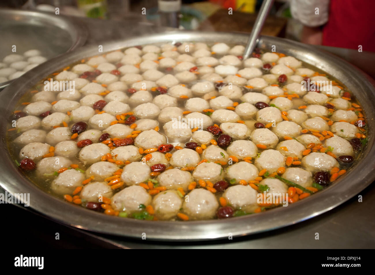boiled small dumplings on food market in Beijing, China Stock Photo - Alamy