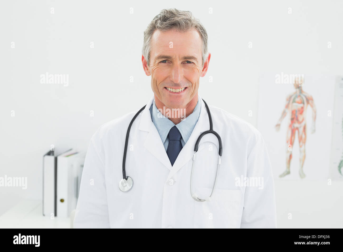 Doctor in his office hi-res stock photography and images - Alamy