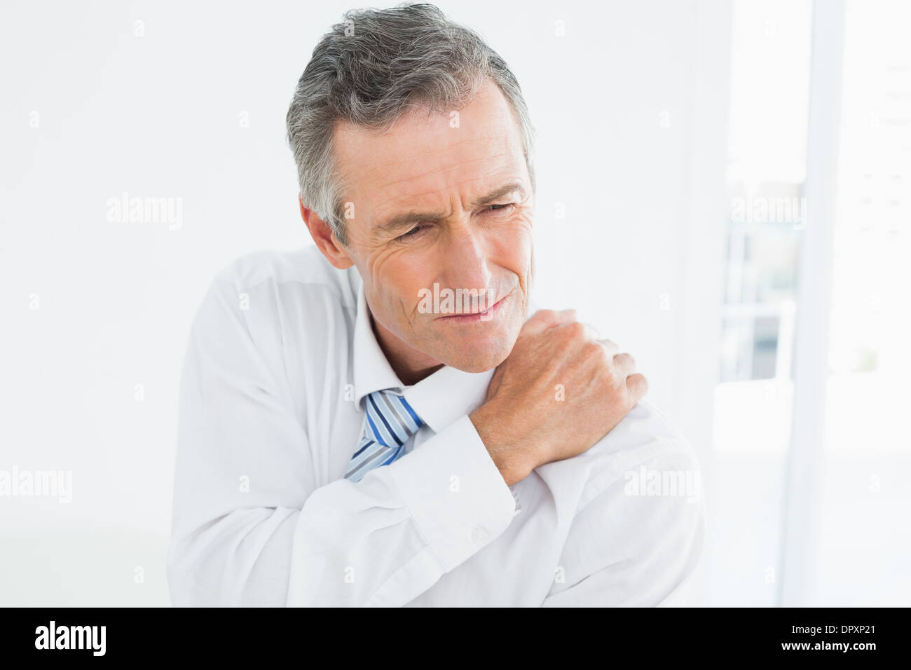 Business man shoulder pain in hi-res stock photography and images - Alamy
